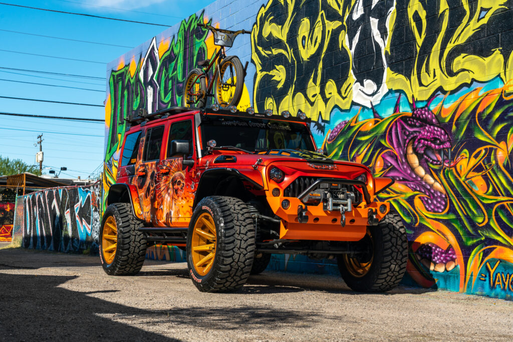 22×12 M25 OffRoad Monster Wheels on the 2021 SEMA Orange Jeep JK ...