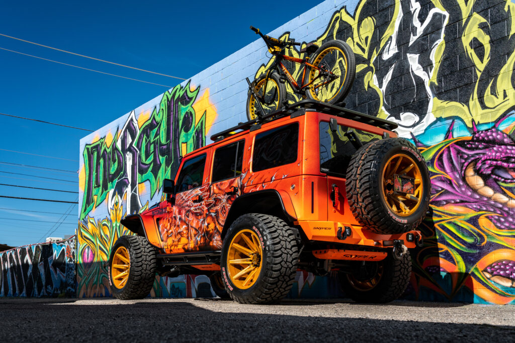 22×12 M25 OffRoad Monster Wheels on the 2021 SEMA Orange Jeep JK ...