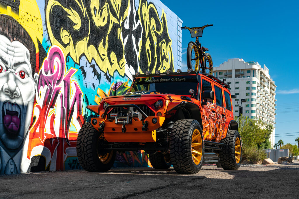 22×12 M25 OffRoad Monster Wheels on the 2021 SEMA Orange Jeep JK ...